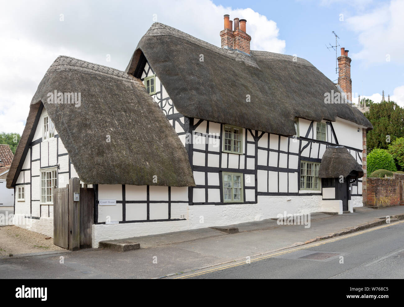 Half Timbered Black And White Thatched Cottage High Resolution Stock ...