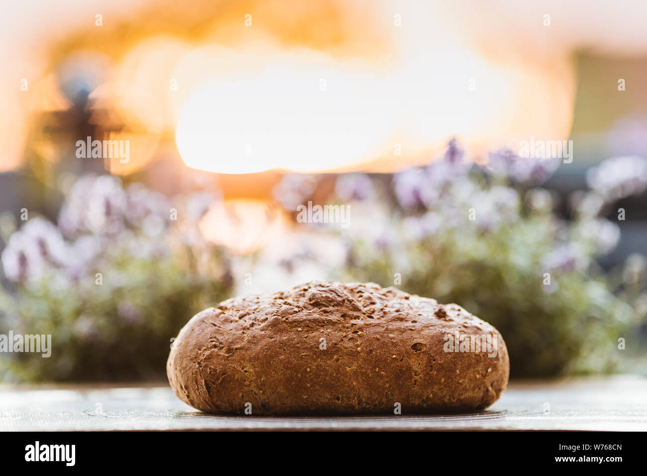 Handmade tasty bread on the table. Rustic Stock Photo - Alamy