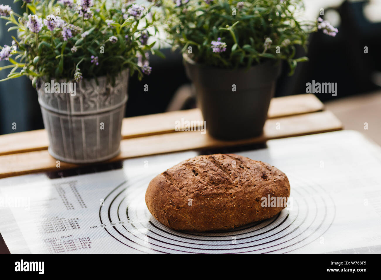 Rustic loaf of bread on white top view hi-res stock photography and ...