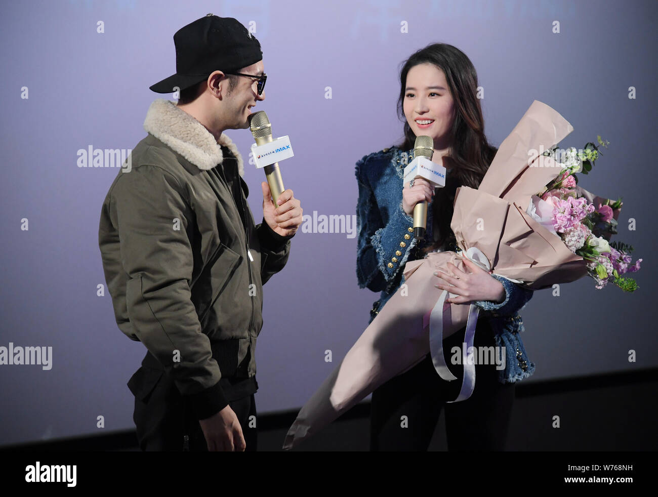 Chinese actress Liu Yifei and Chinese actor Huang Xiaoming attend a ...