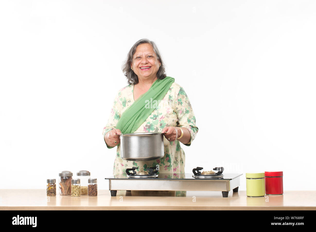 Indian old woman cooking food hi-res stock photography and images - Alamy