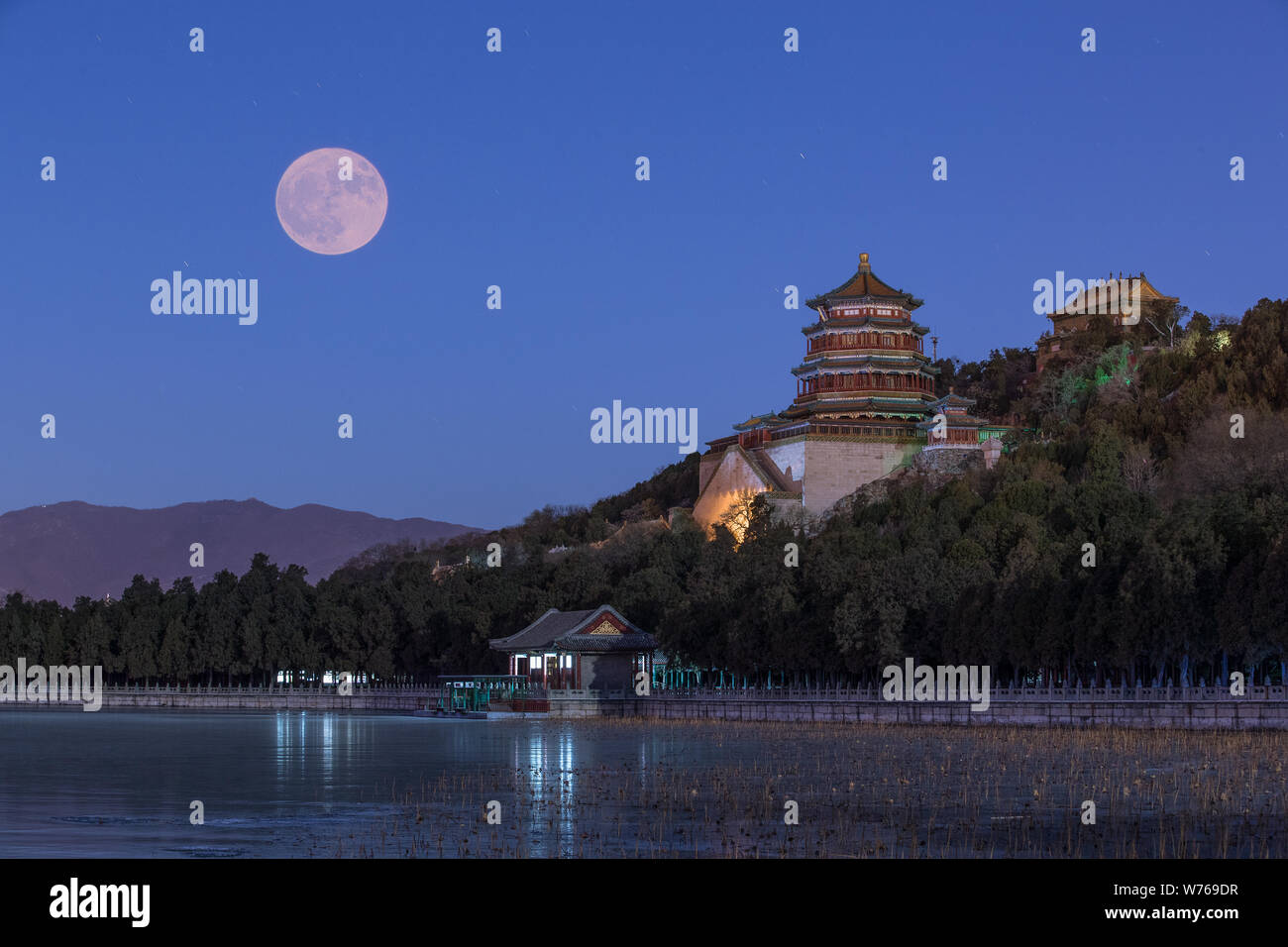 A supermoon is seen in the night sky over Beijing, China, 3 December ...