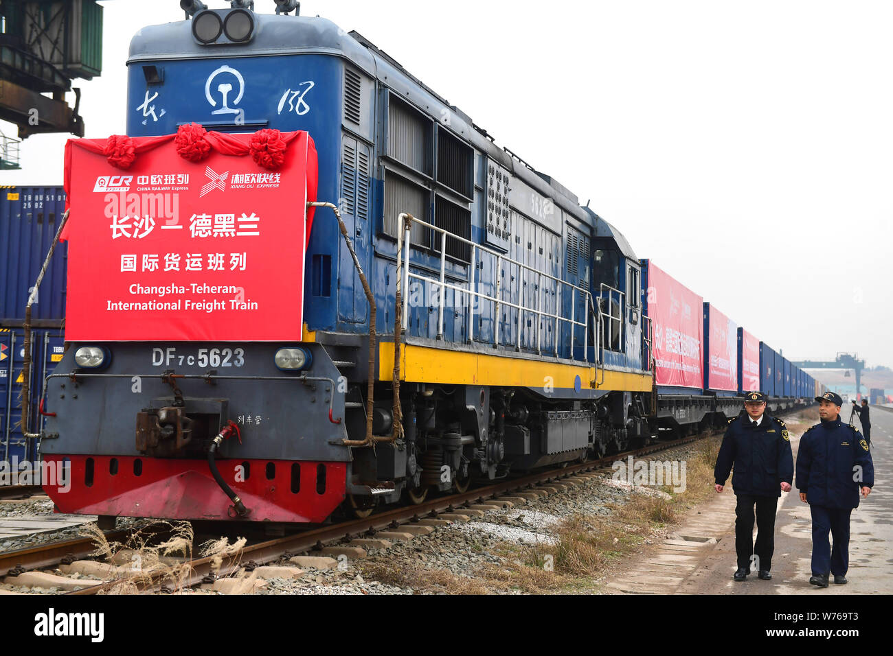 Chinese customs officers check a freight train of China Railway Express ...