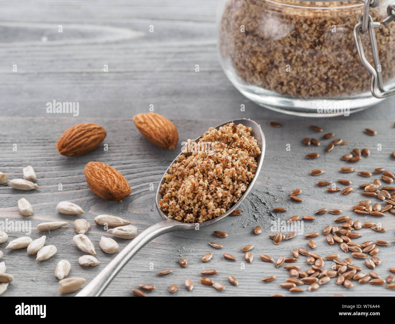Homemade LSA mix in spoon - Linseed or flax seeds, Sunflower seeds and ...