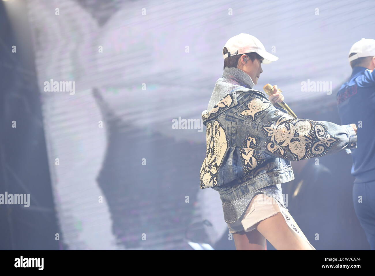 Chinese singer Li Yuchun or Chris Lee performs at a concert to release ...