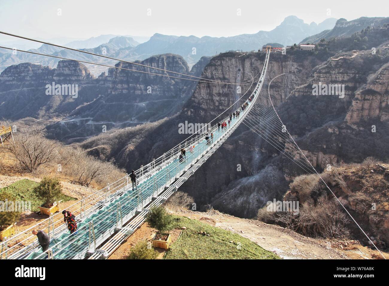 General view of the world's longest glass suspension bridge at Hongyagu ...