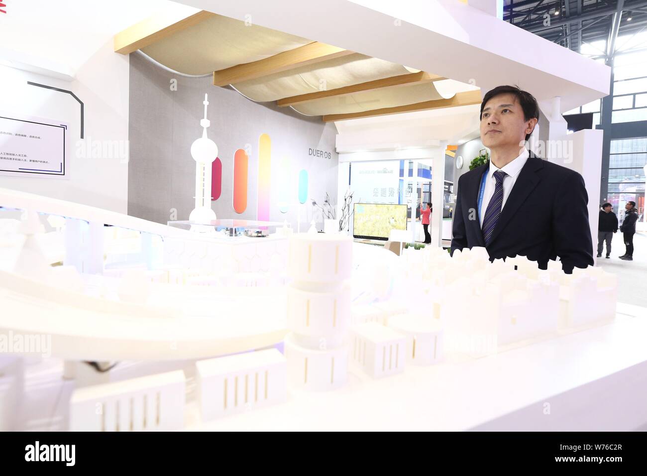 Robin Li Yanhong, Chairman and CEO of Baidu Inc., poses for photos at ...