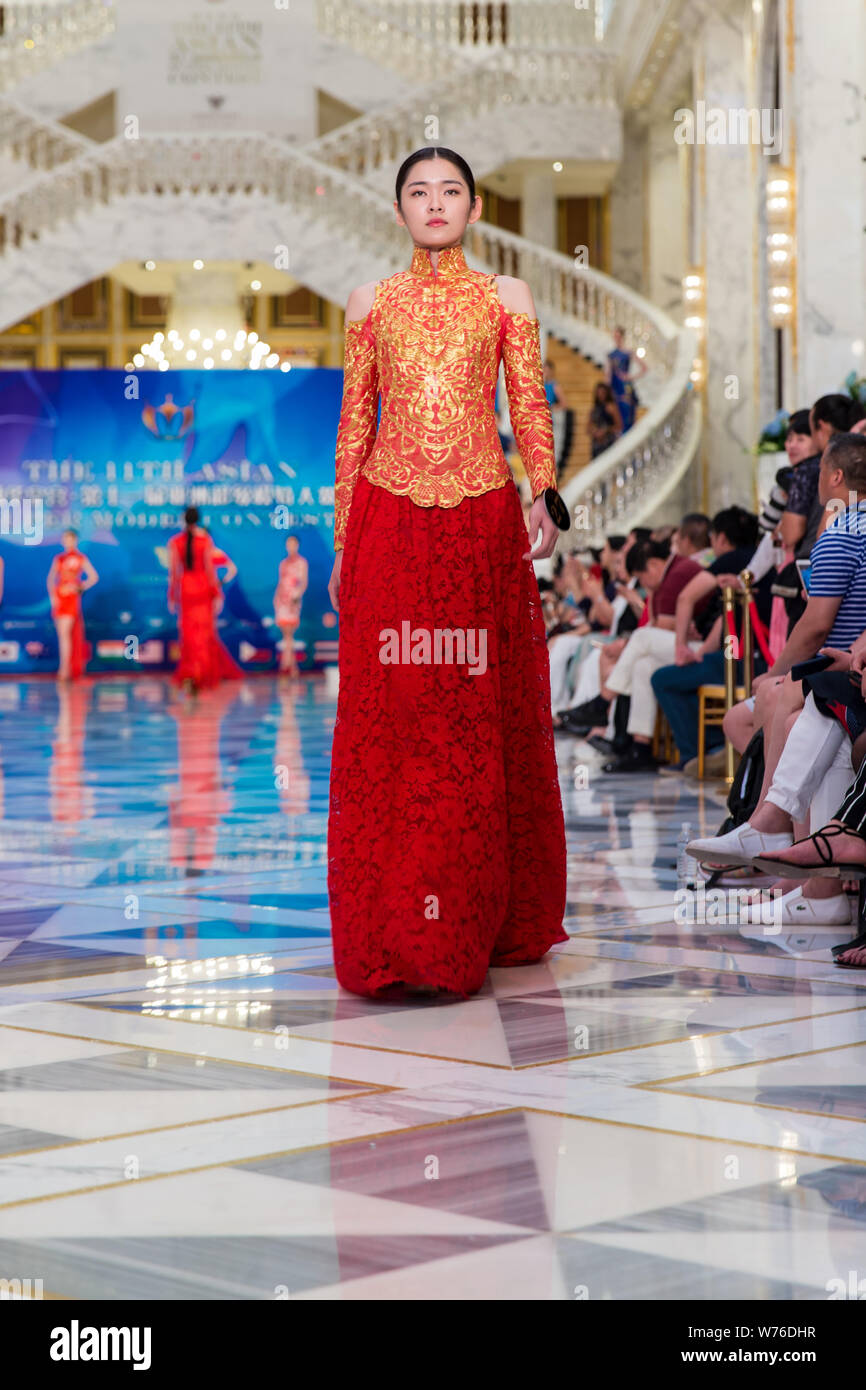 A contestant displays a creation during the 11th Asian Supermodel ...