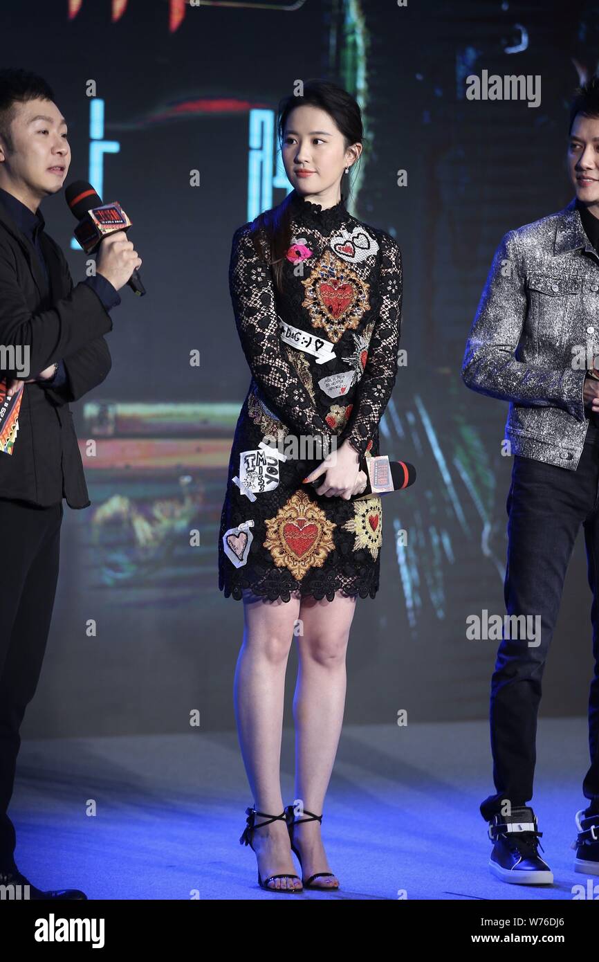 Chinese actress Liu Yifei, center, attends a press conference for their ...