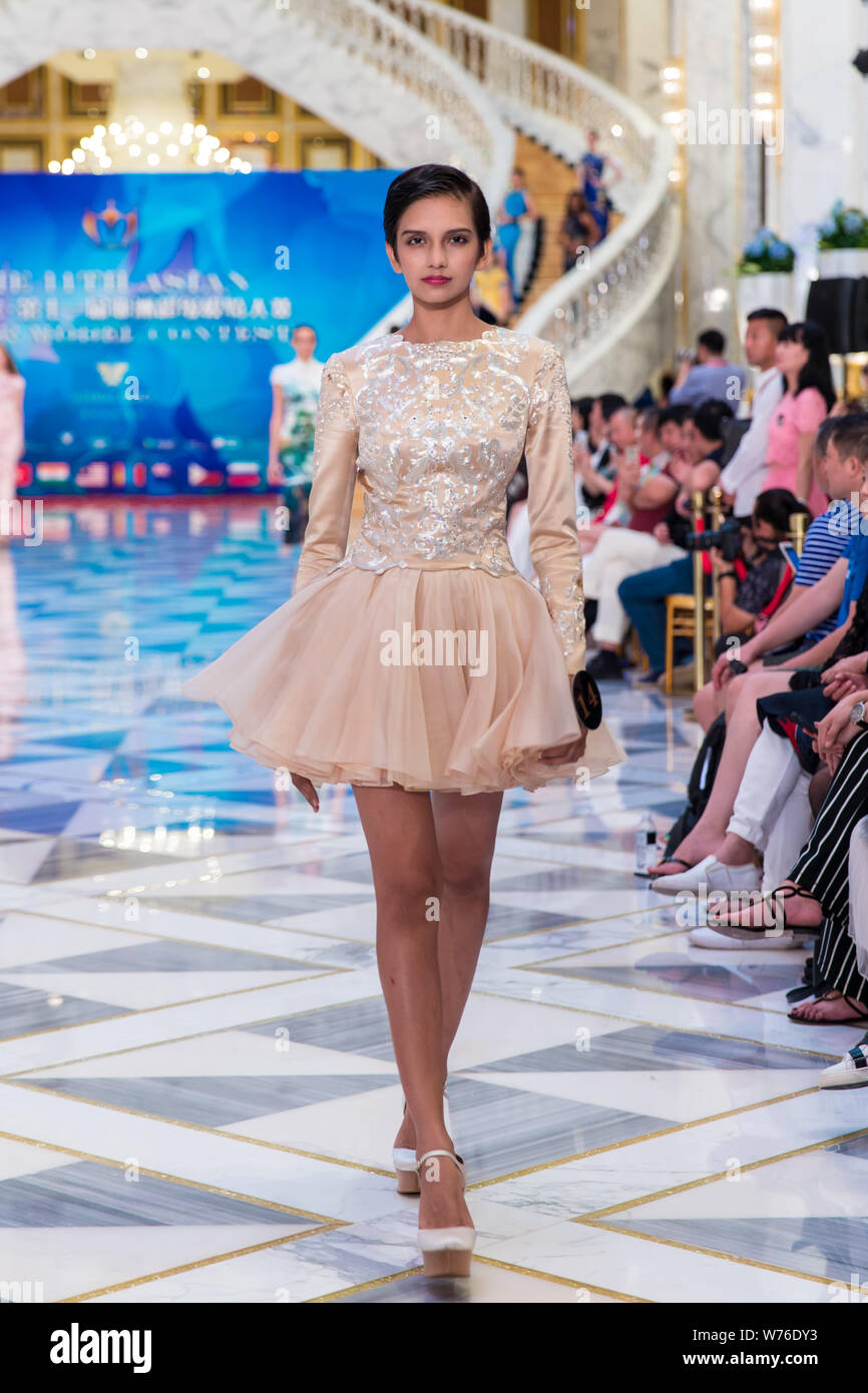 A contestant displays a creation during the 11th Asian Supermodel ...