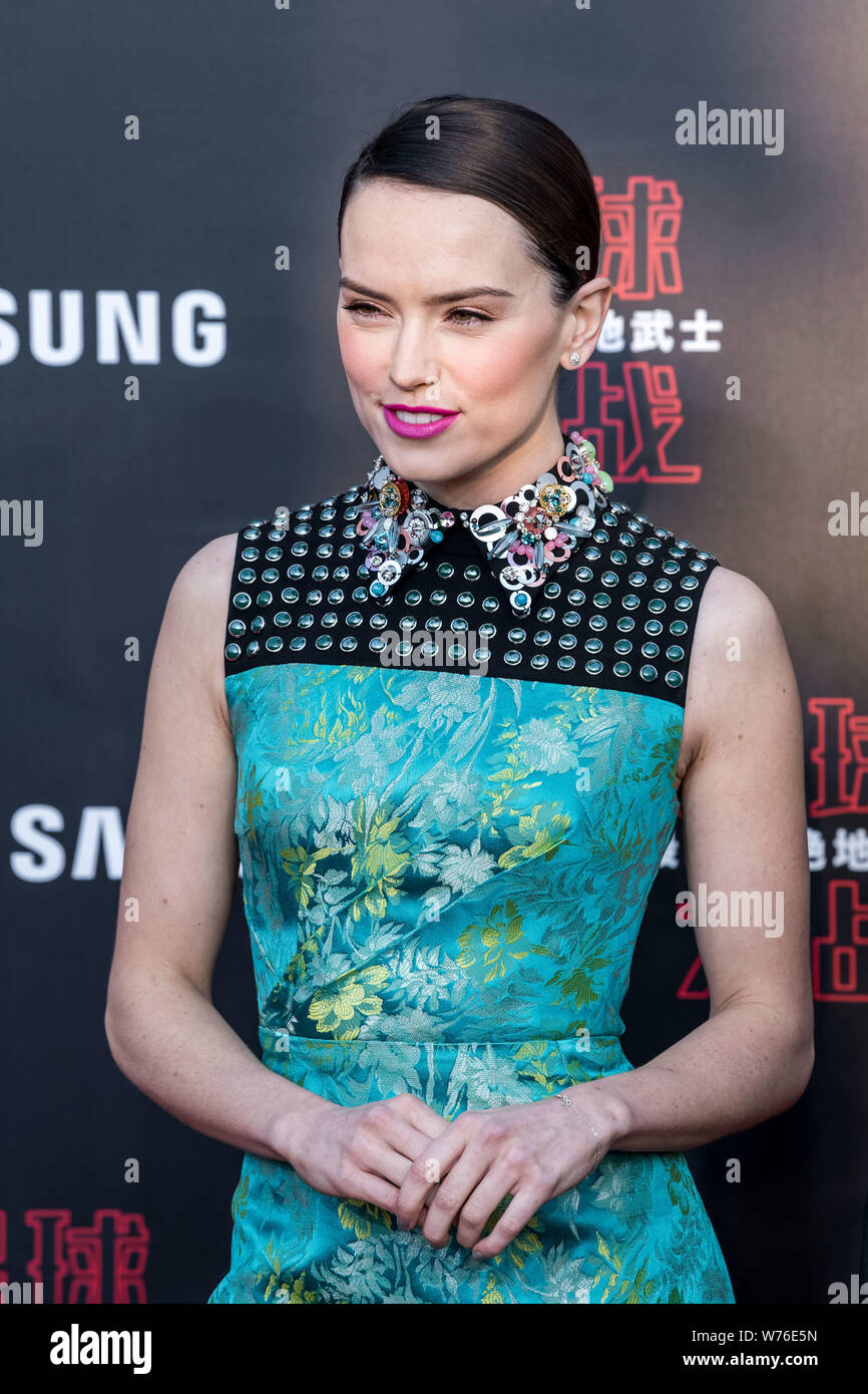 English actress and singer Daisy Ridley poses as she arrives on the red ...