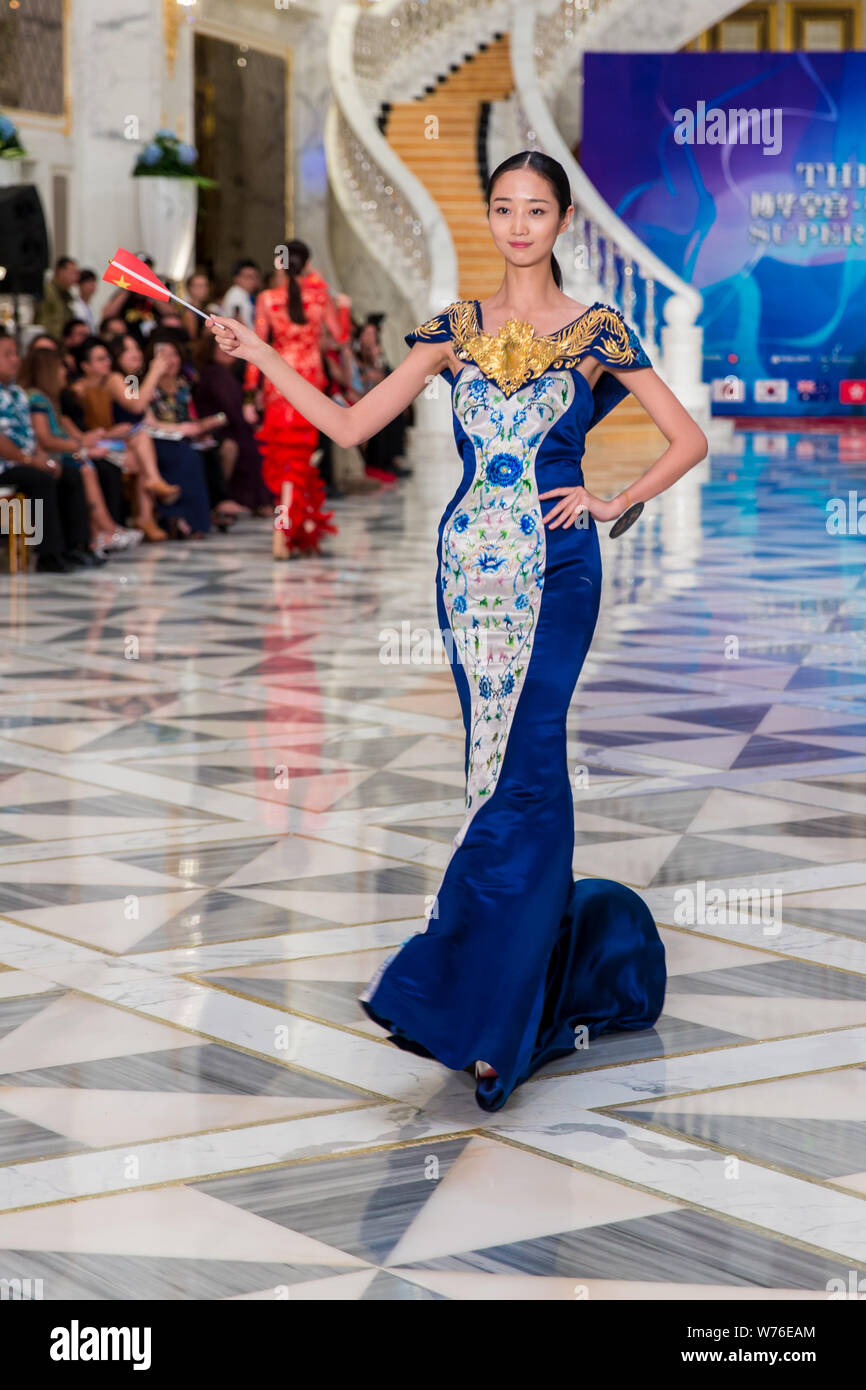 A contestant displays a creation during the 11th Asian Supermodel ...