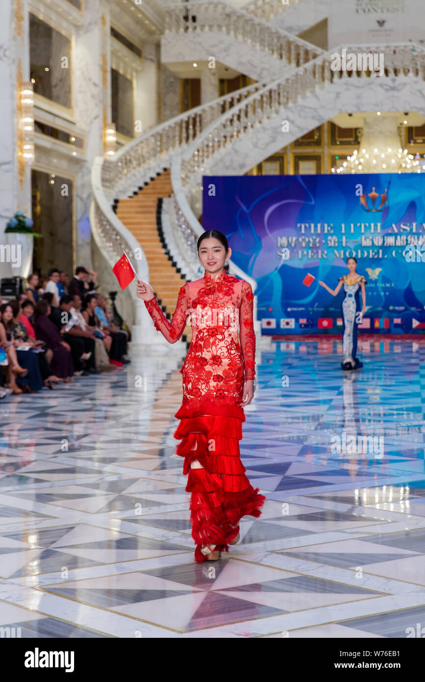 A contestant displays a creation during the 11th Asian Supermodel ...