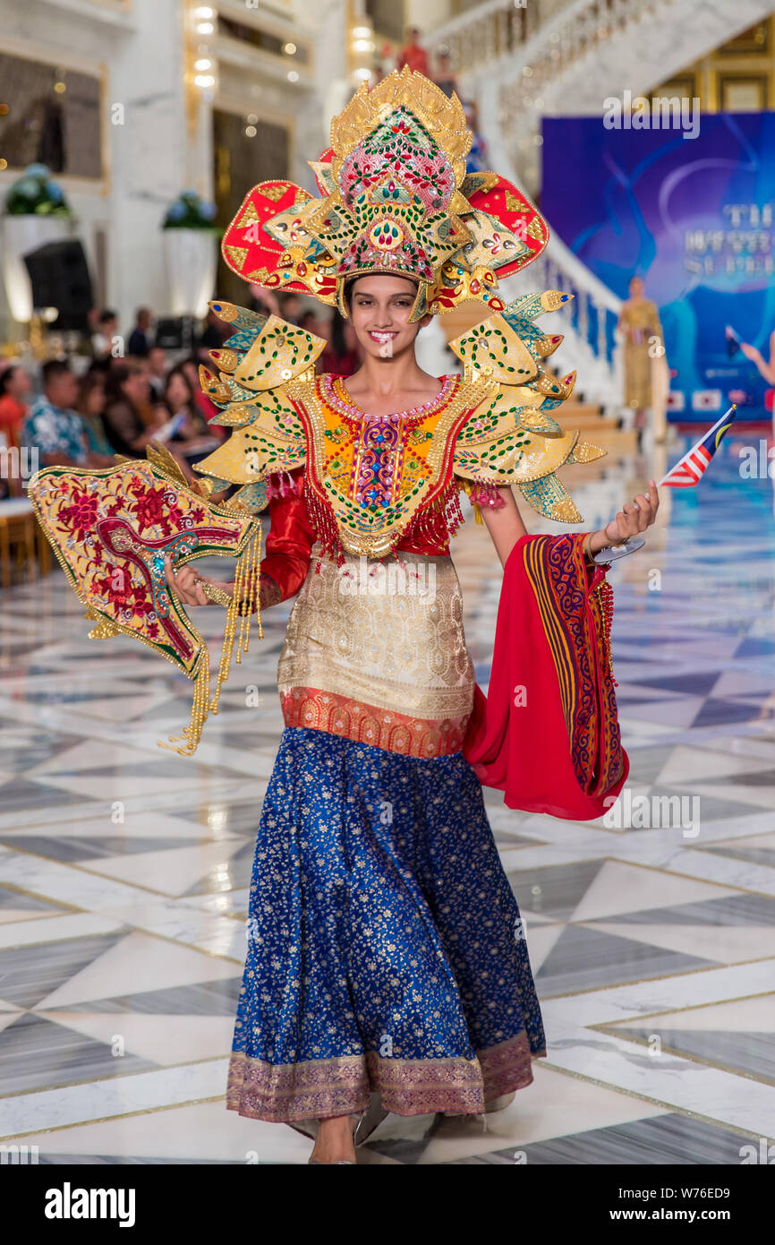A contestant displays a creation during the 11th Asian Supermodel ...