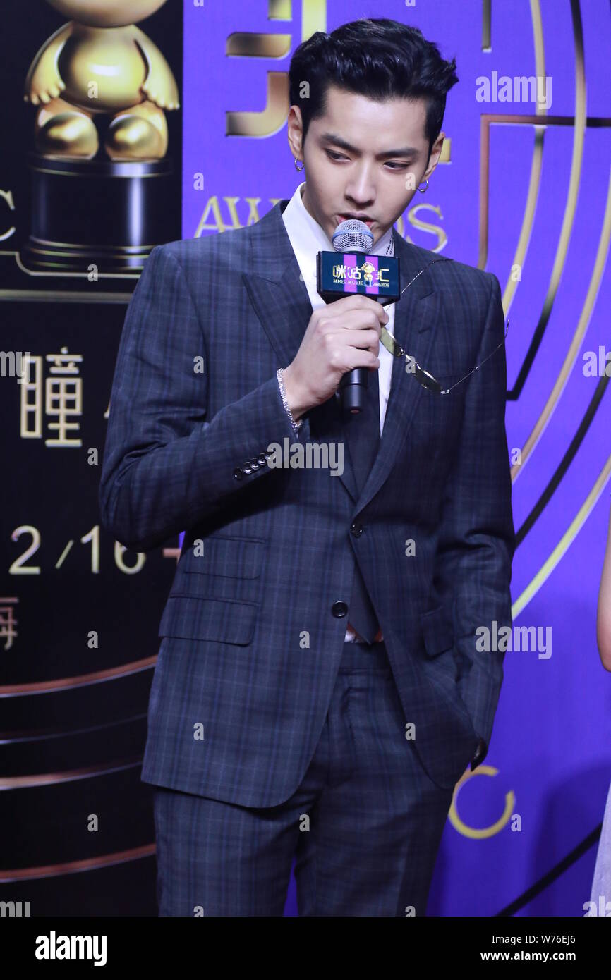 Chinese singer and actor Kris Wu or Wu Yifan poses as he arrives on the ...