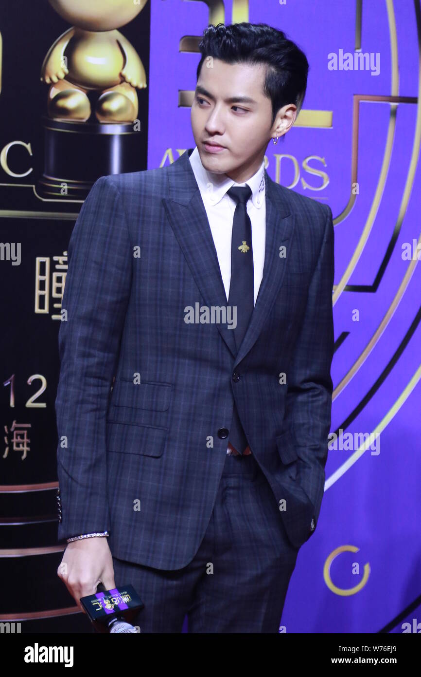 Chinese singer and actor Kris Wu or Wu Yifan poses as he arrives on the ...
