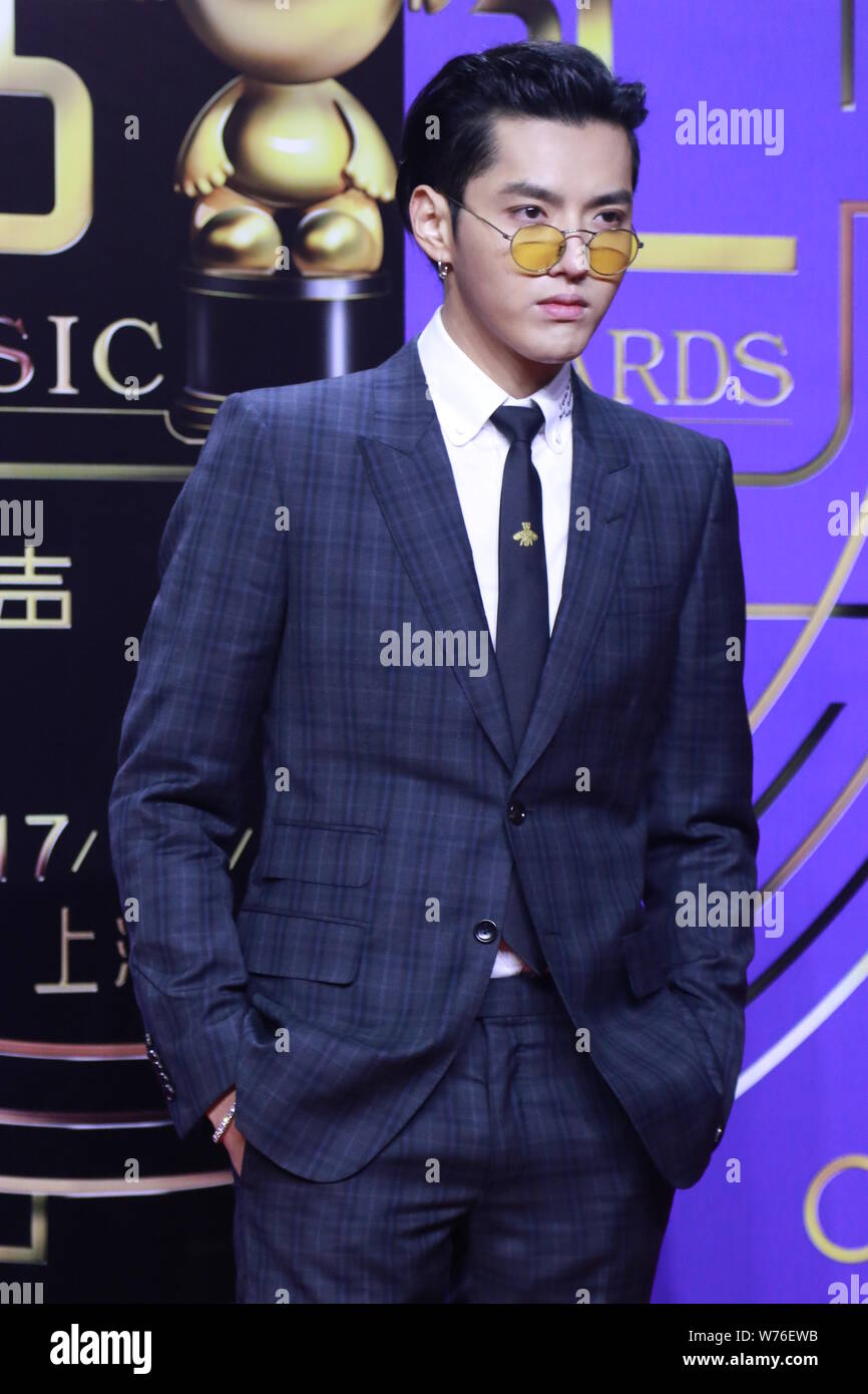 Chinese singer and actor Kris Wu or Wu Yifan poses as he arrives on the ...