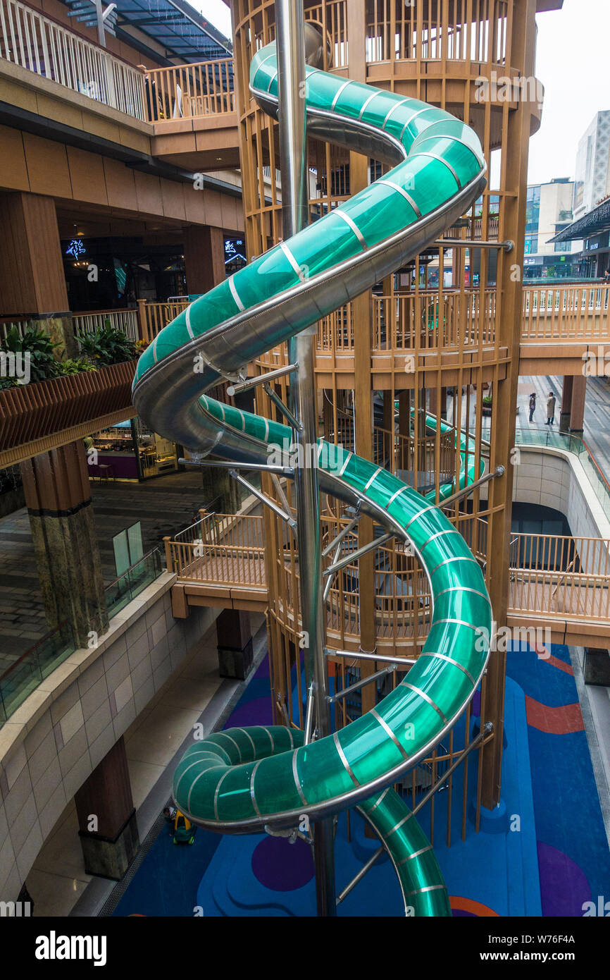 --FILE--View of the 15-meter tall slide at a shopping mall in Chengdu ...