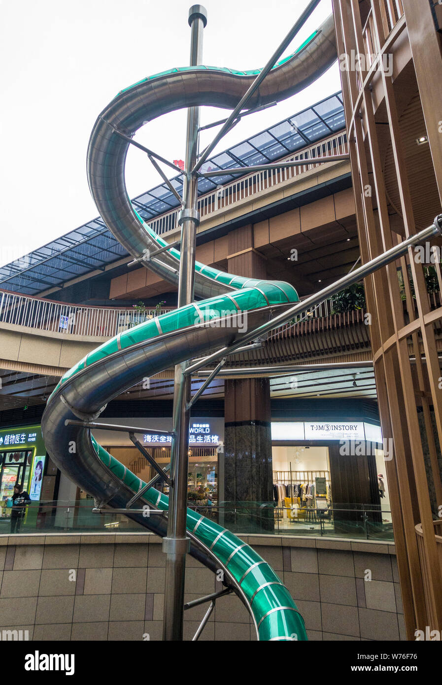 --FILE--View of the 15-meter tall slide at a shopping mall in Chengdu ...
