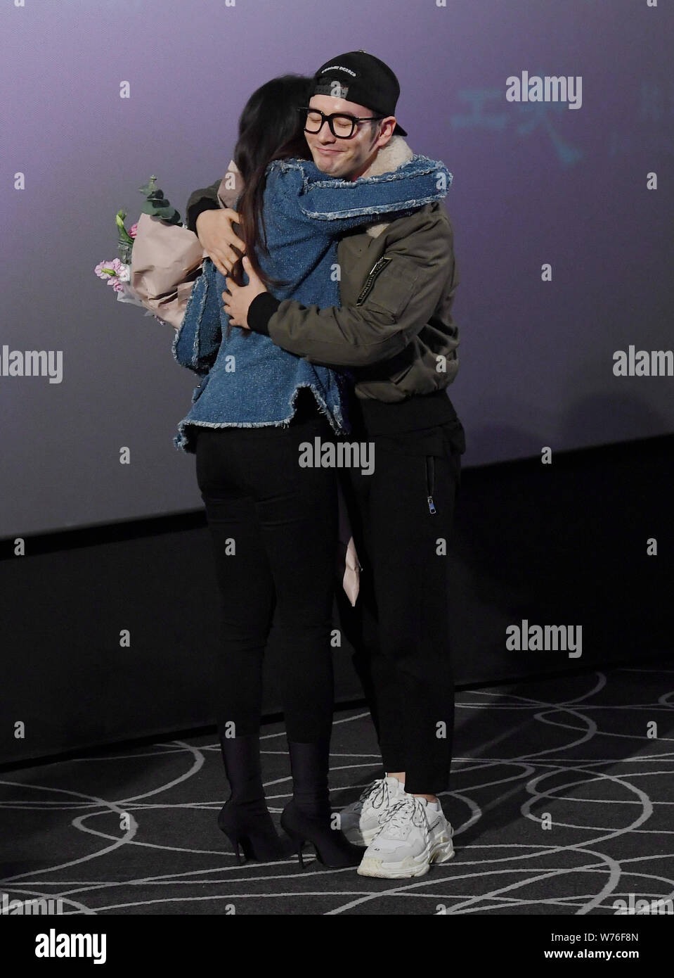 Chinese actress Liu Yifei and Chinese actor Huang Xiaoming attend a ...