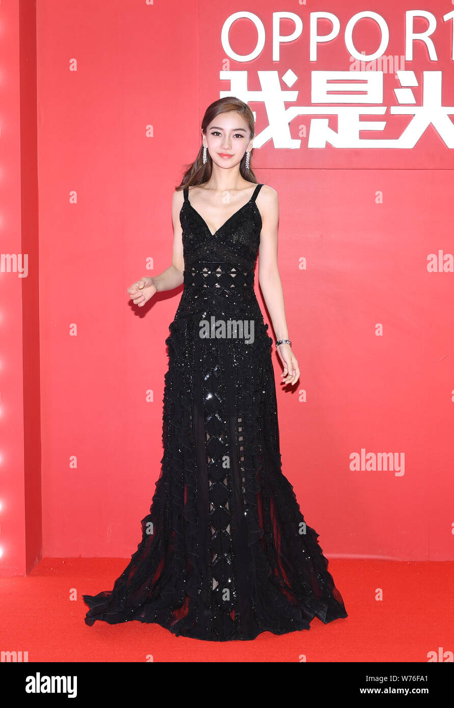 Hong Kong actress Angelababy arrives on the red carpet for the 2017 Toutiao Annual Awards ...
