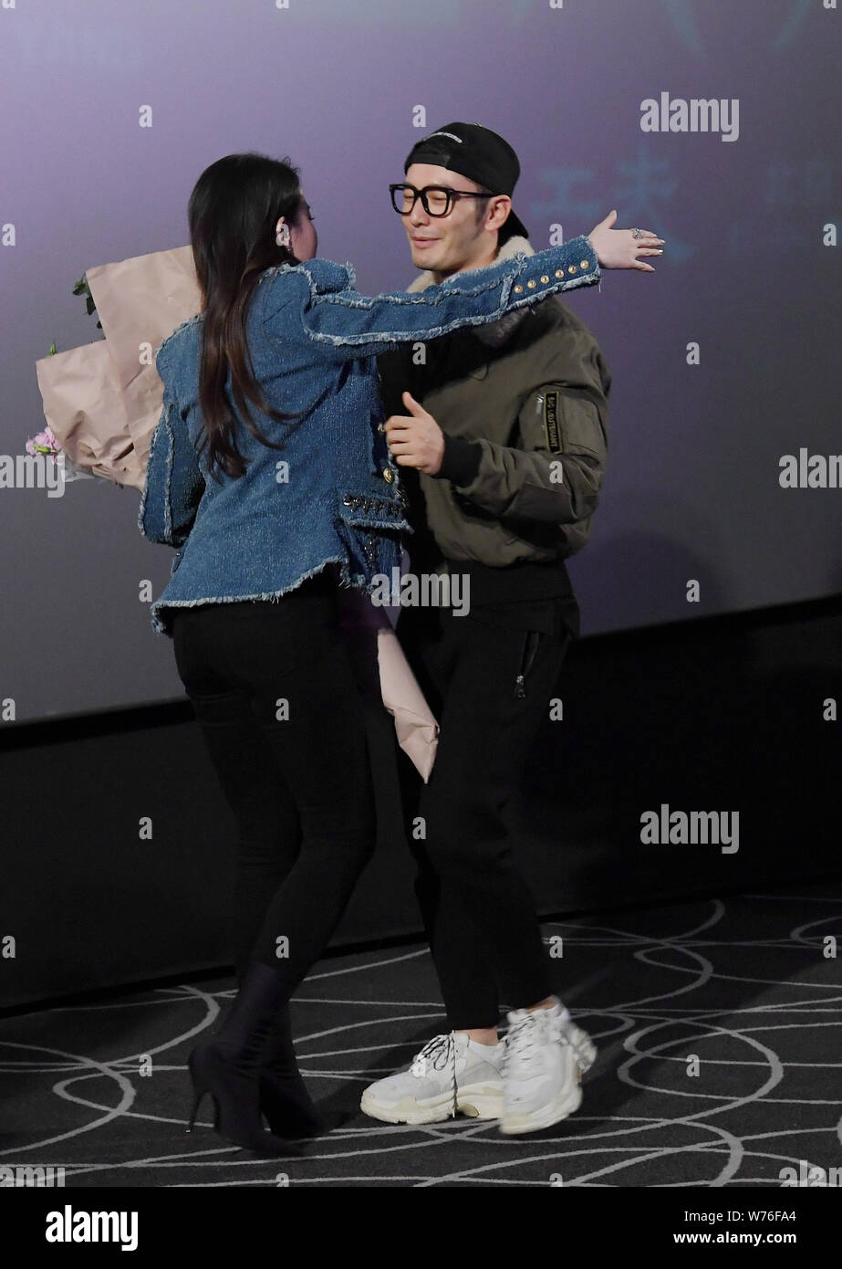 Chinese actress Liu Yifei and Chinese actor Huang Xiaoming attend a ...