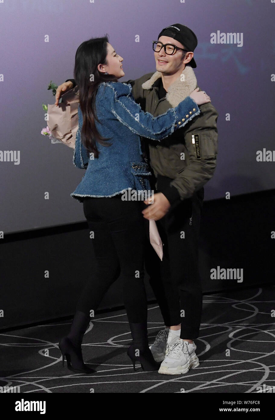 Chinese actress Liu Yifei and Chinese actor Huang Xiaoming attend a ...