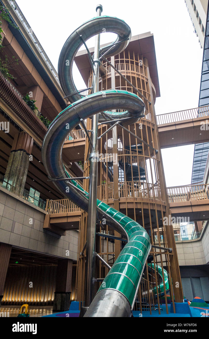 --FILE--View of the 15-meter tall slide at a shopping mall in Chengdu ...