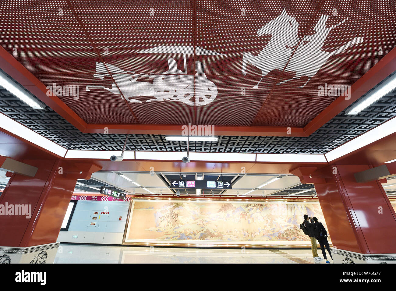 Interior view of a metro station featuring exquisite murals and designs ...