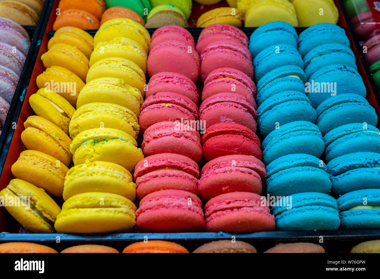 Tray of colorful macaron for sale at patisserie Stock Photo - Alamy