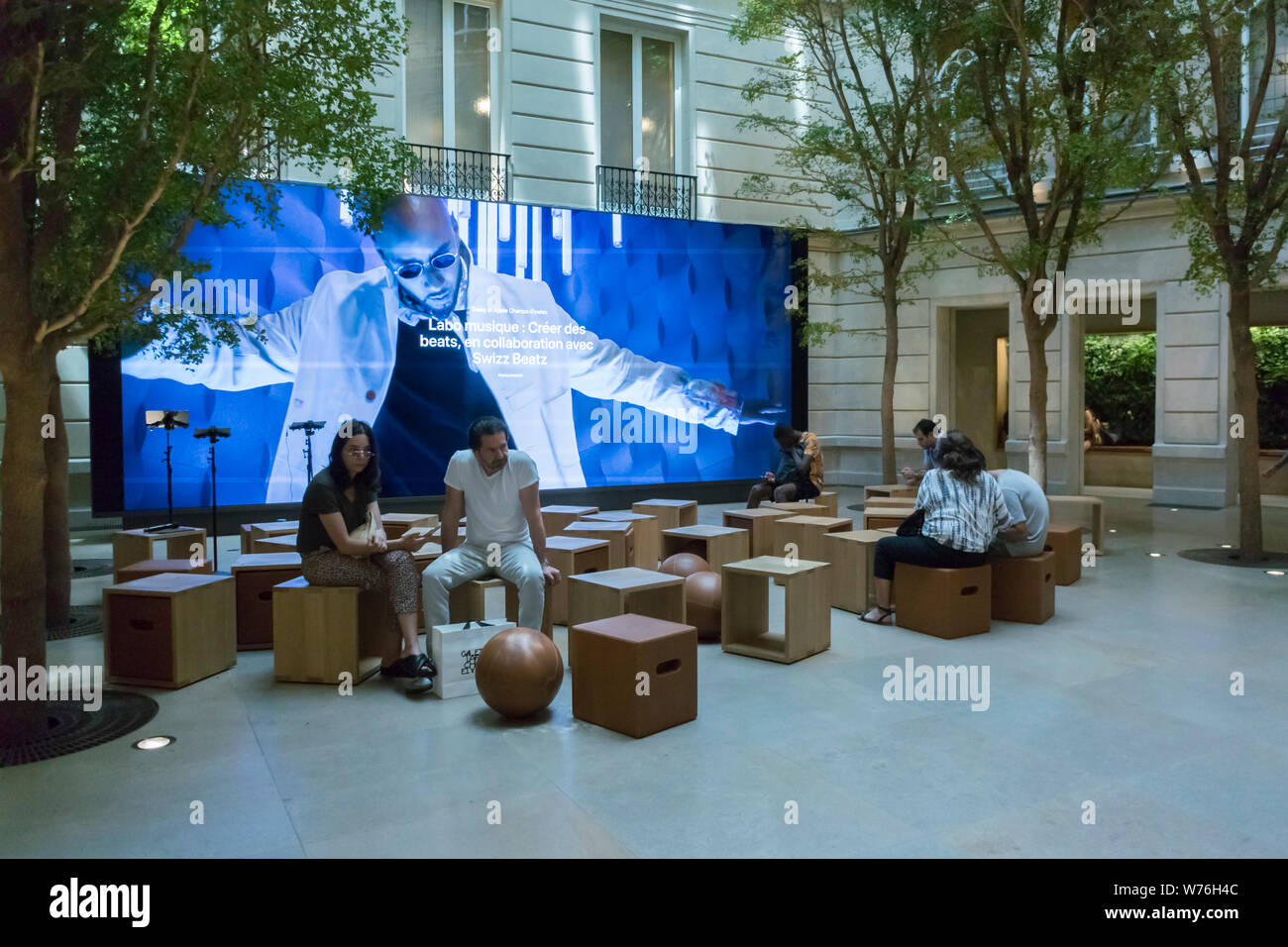 Paris, FRANCE, People Shopping, sitting, inside Apple Store Boutique ...