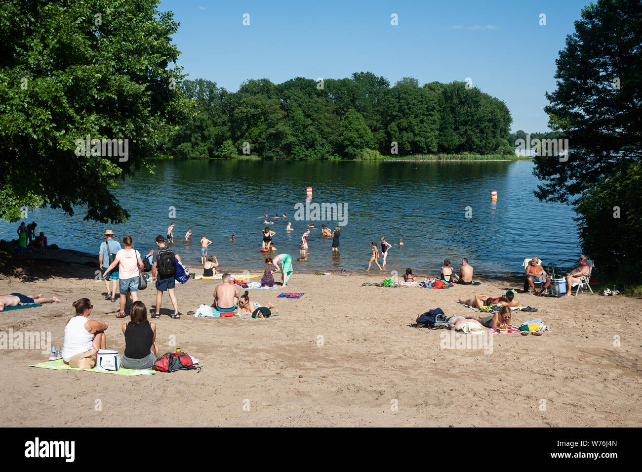 13.06.2019, Berlin, Germany, Europe - People swim and relax on a hot summer day at Lake Tegel in ...