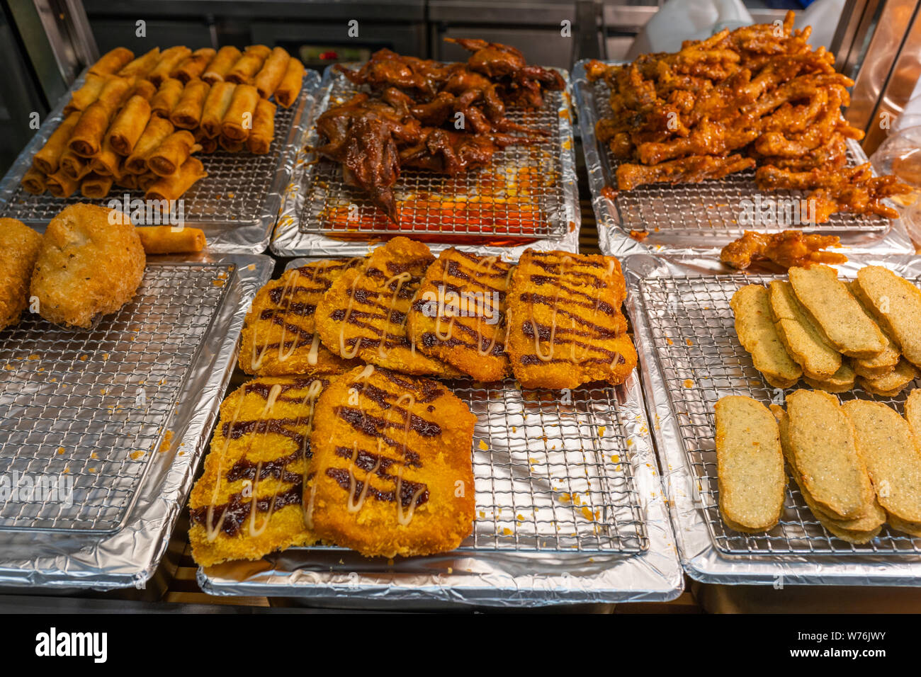 Delicious spring rolls and fried street food at night market Stock ...