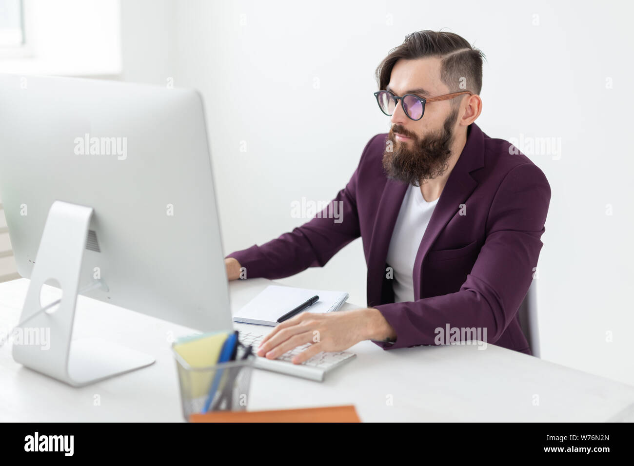 people, design and style concept - graphic designer sketching new ...