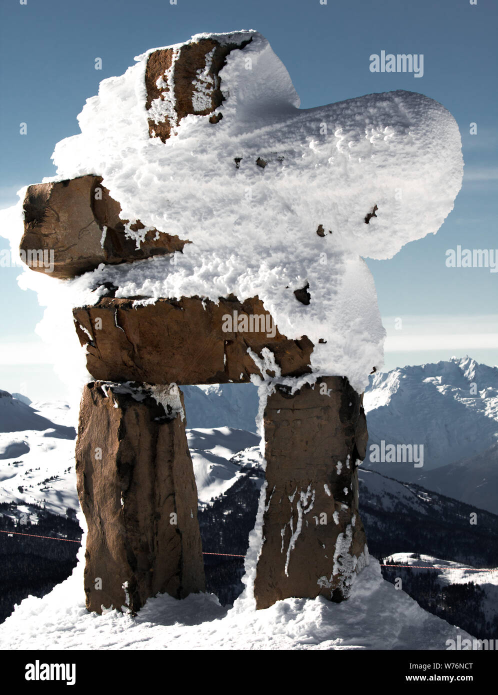 snow blasted inukshuk on blackmon ski mountain during winter, a roughly ...