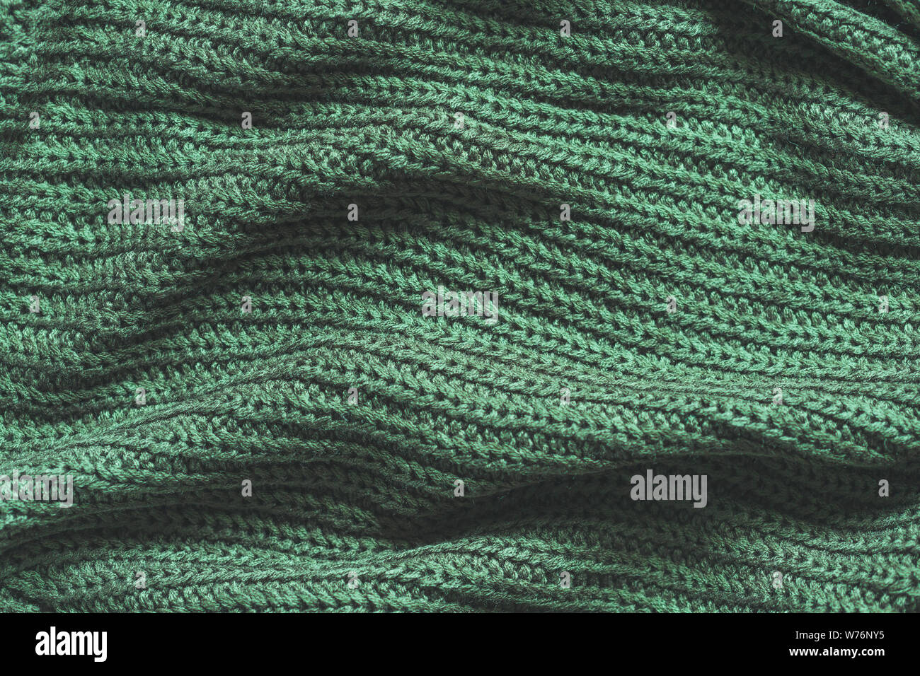 Woolen green clothes background Stock Photo - Alamy