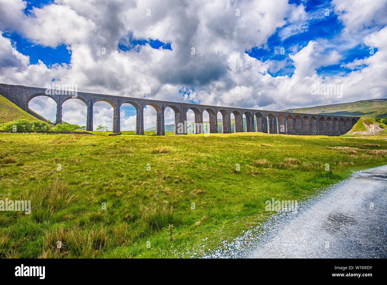 View of a large old Victorian railway viaduct across valley in rural ...