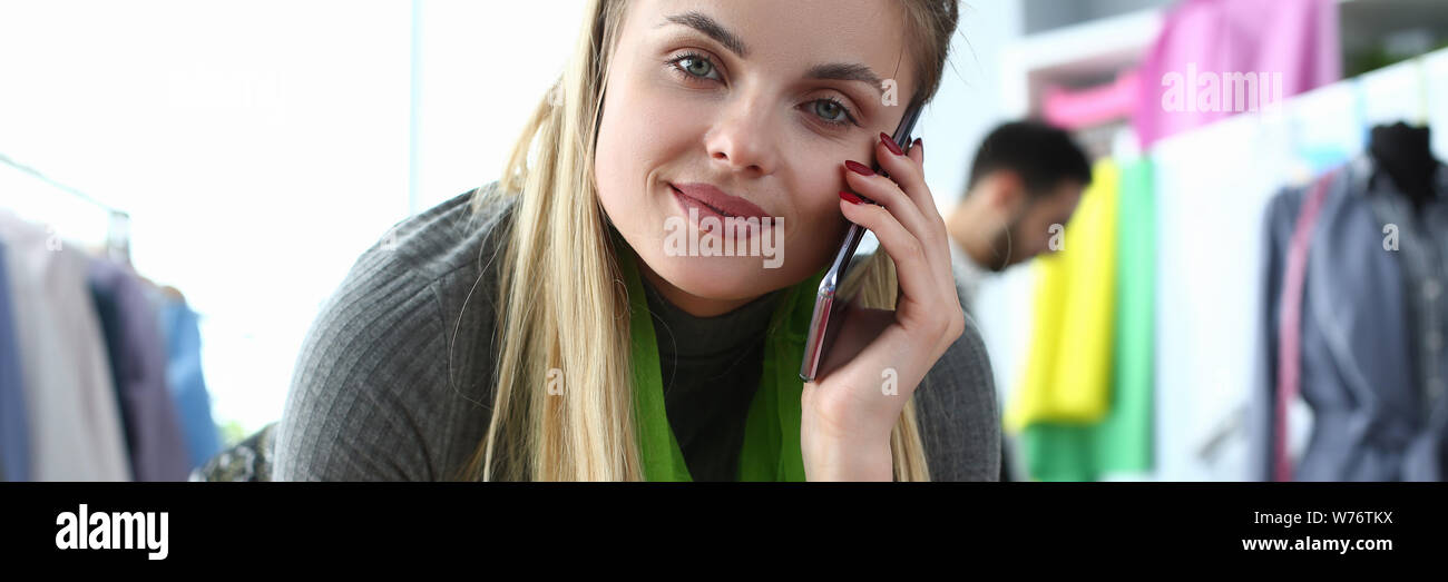 Handmade Clothes Ordering Designer Talking Phone Stock Photo - Alamy