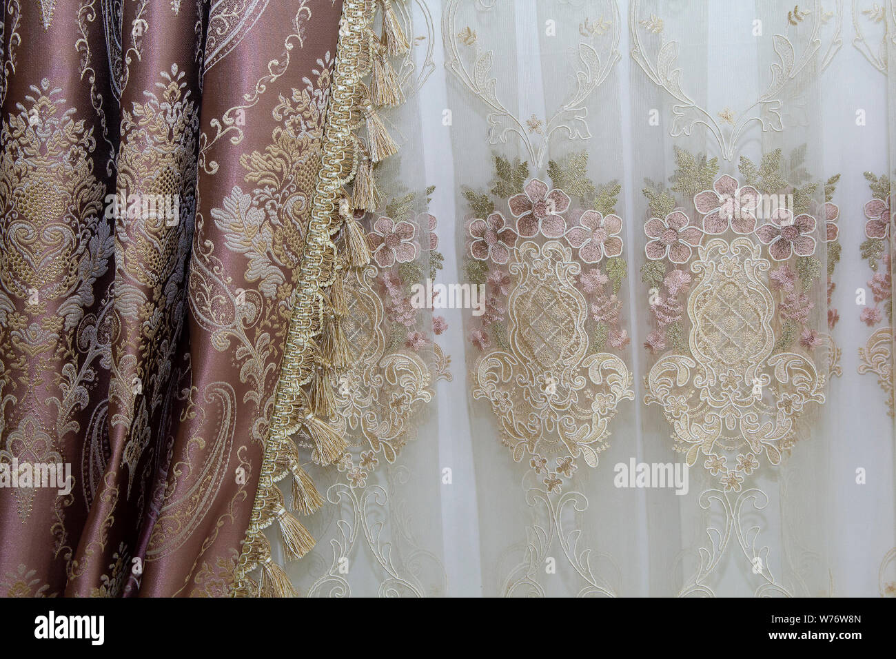 Luxury curtains on the window in a classic style. Interior Stock Photo ...
