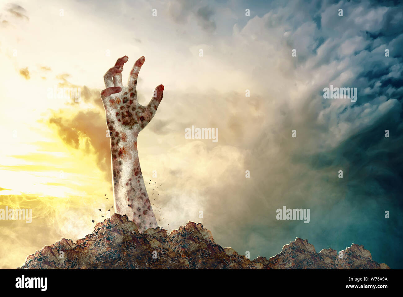 Rise of zombies hand from the ground at night. Halloween concept Stock ...