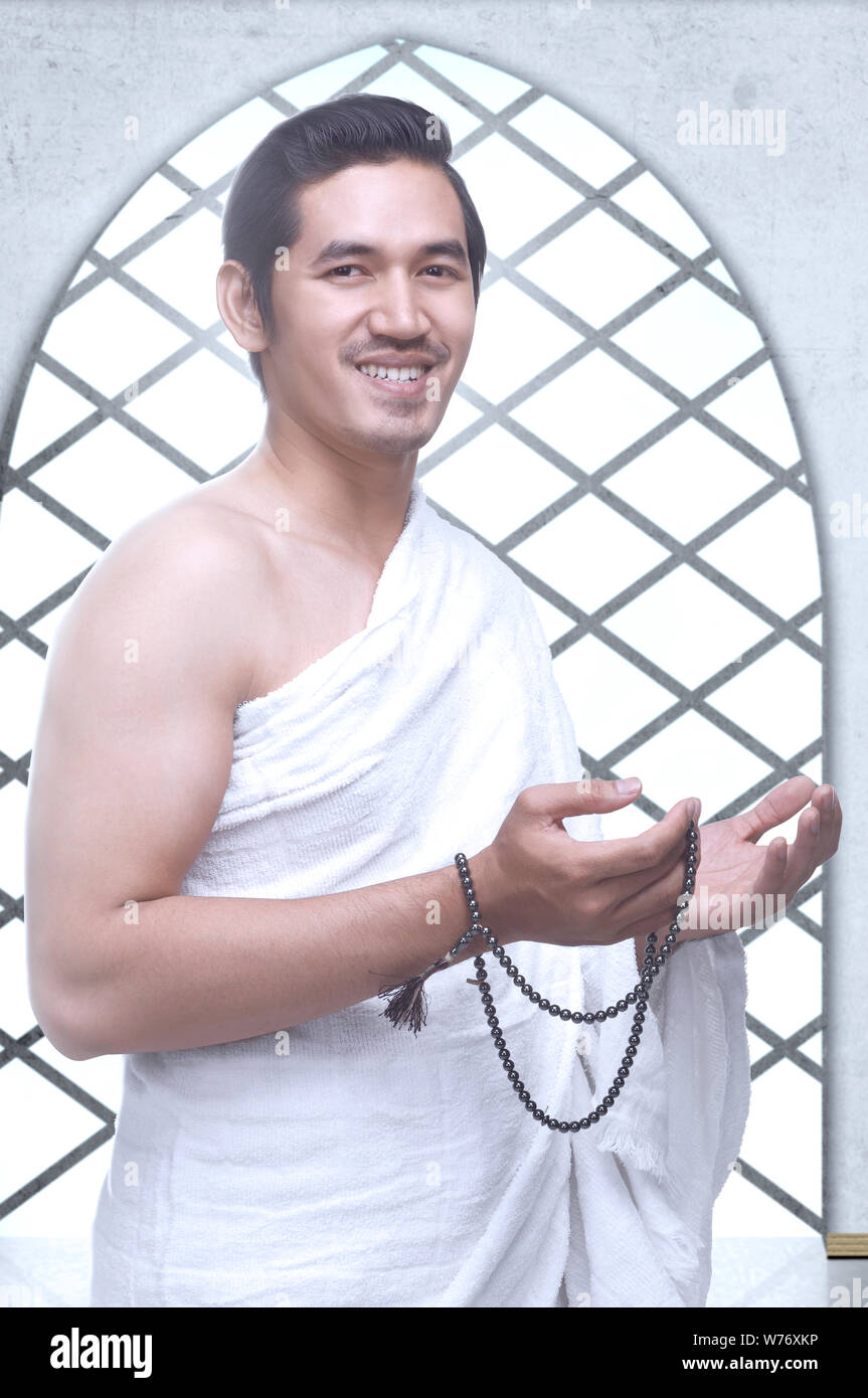 Man standing by mosque hi-res stock photography and images - Alamy