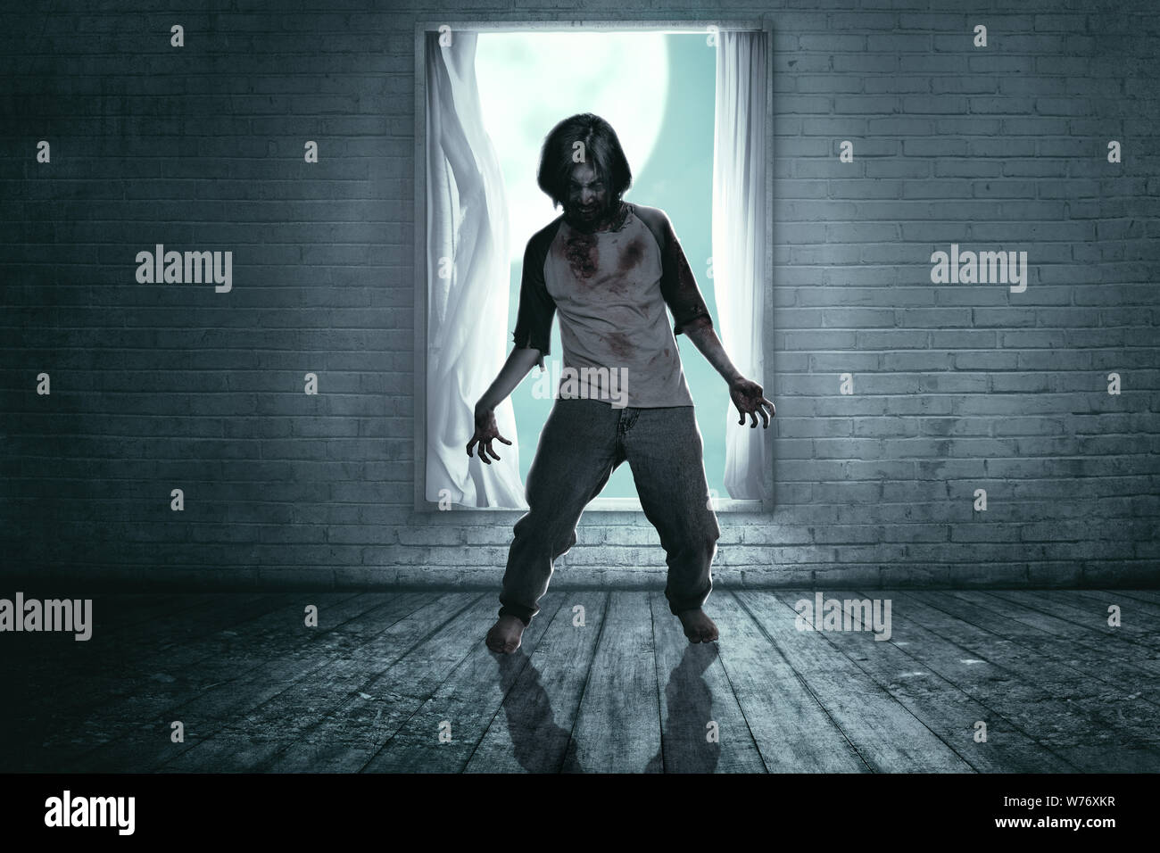 Scary zombies with blood and wound on his body haunted the abandoned ...