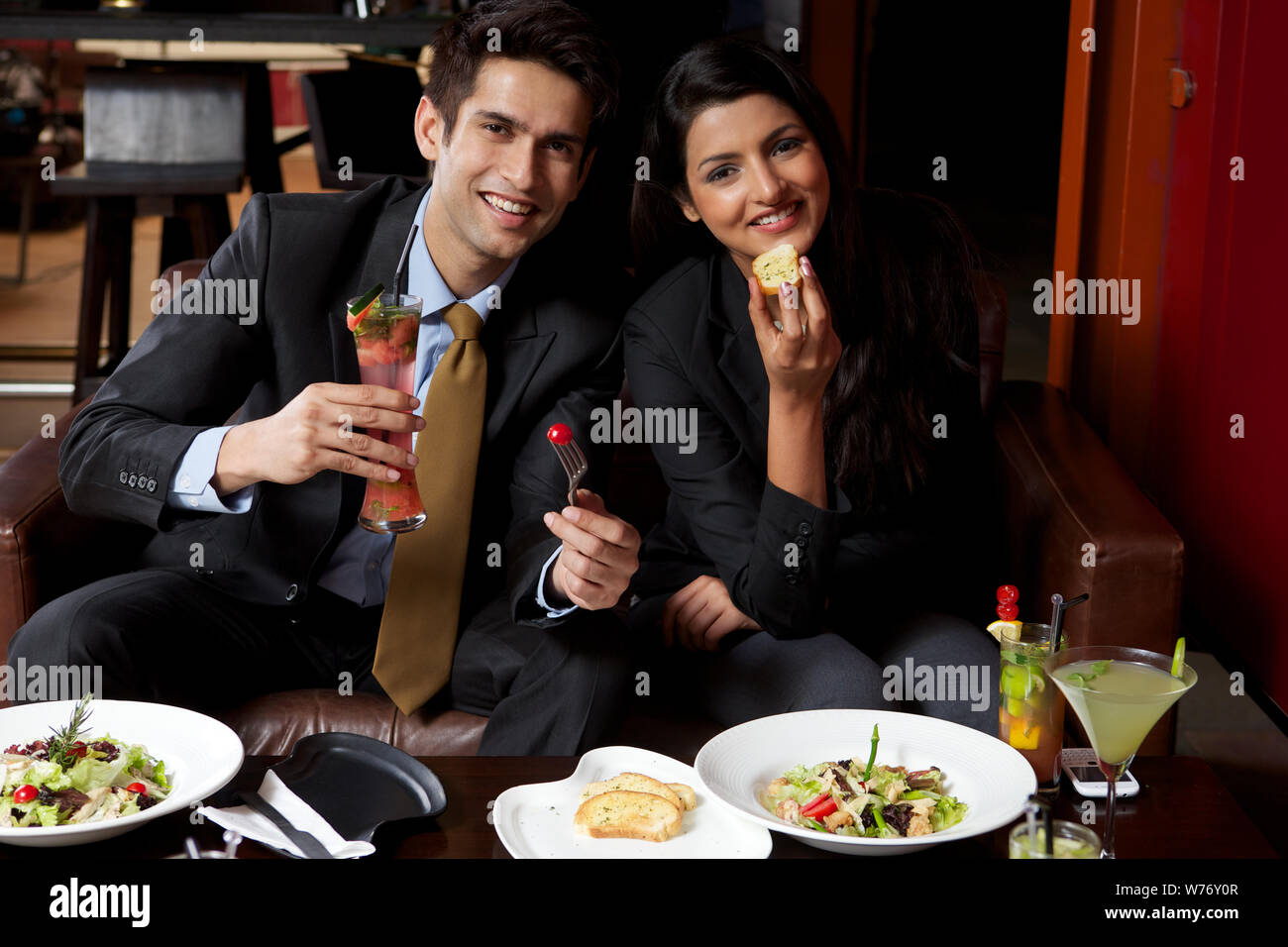 Business executives having dinner in a restaurant Stock Photo - Alamy