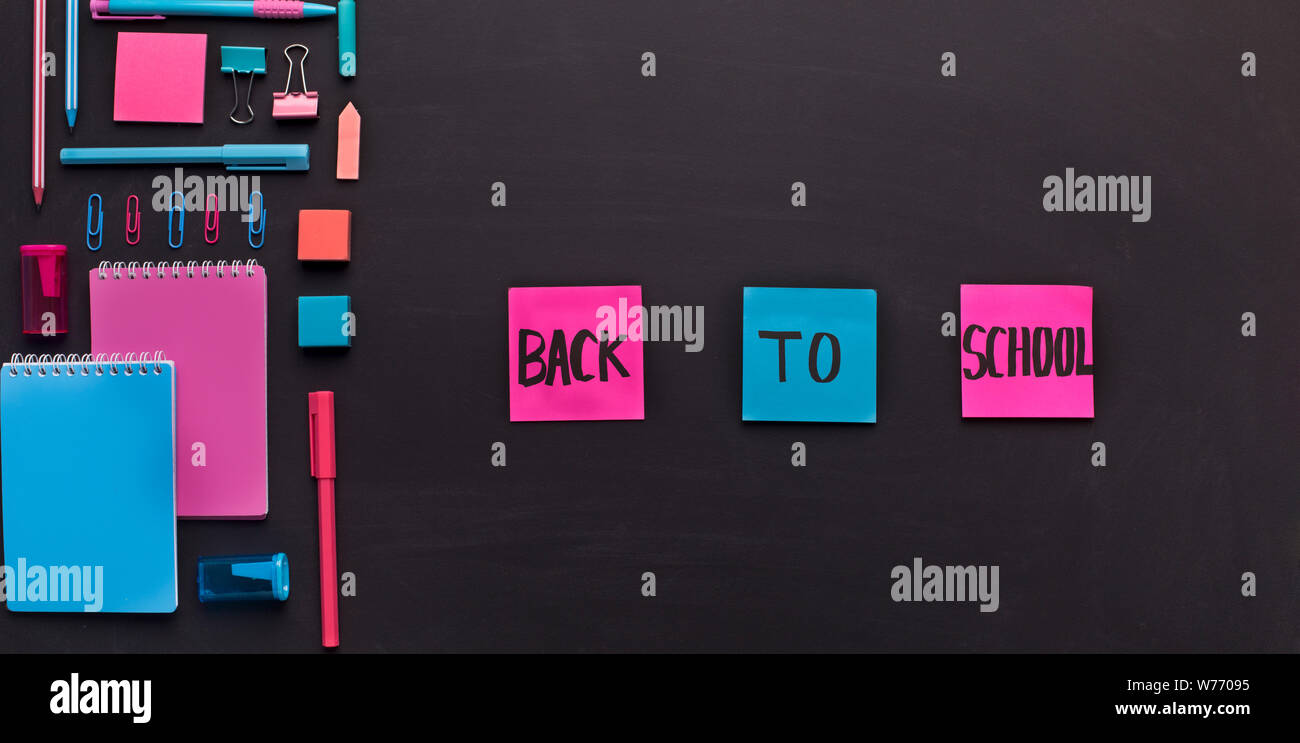 Pink and blue stickers with back to school text on chalk board Stock ...