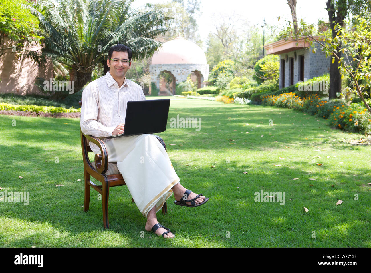 Indian man sitting in front of computer hi-res stock photography and ...