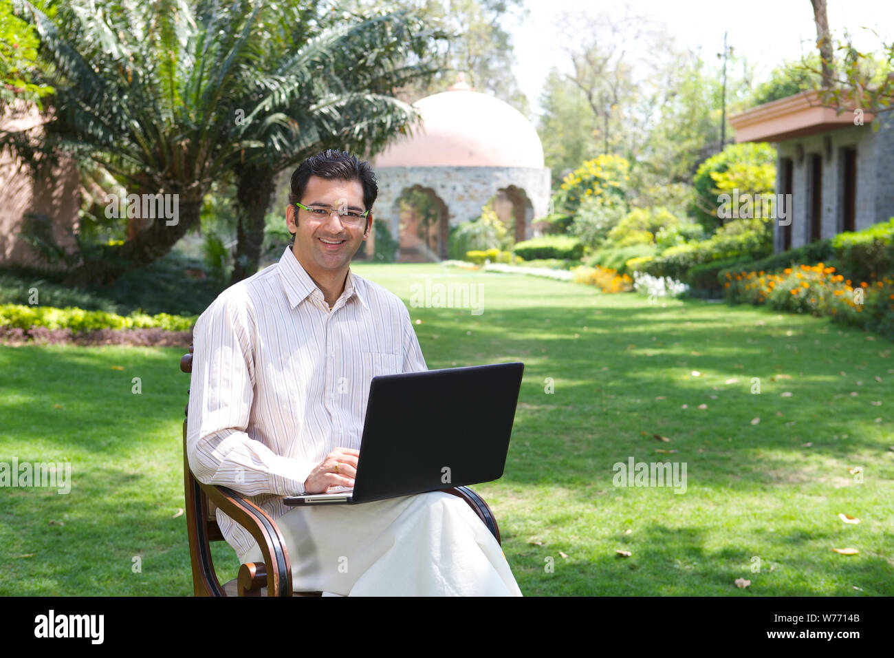 Indian man sitting in front of computer hi-res stock photography and ...