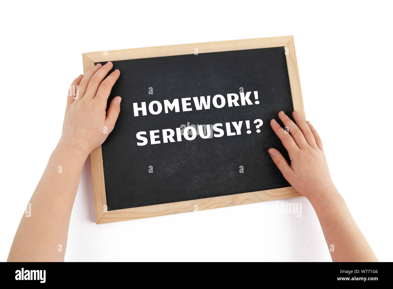 The issue of homework for children depicted with child hands and ...