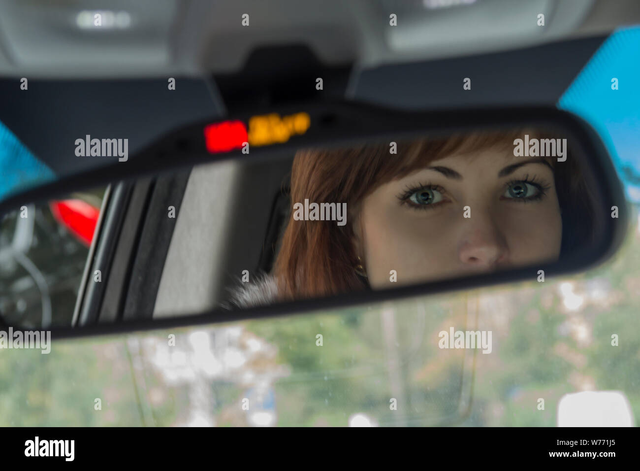 Eyes in rearview mirror hi-res stock photography and images - Alamy