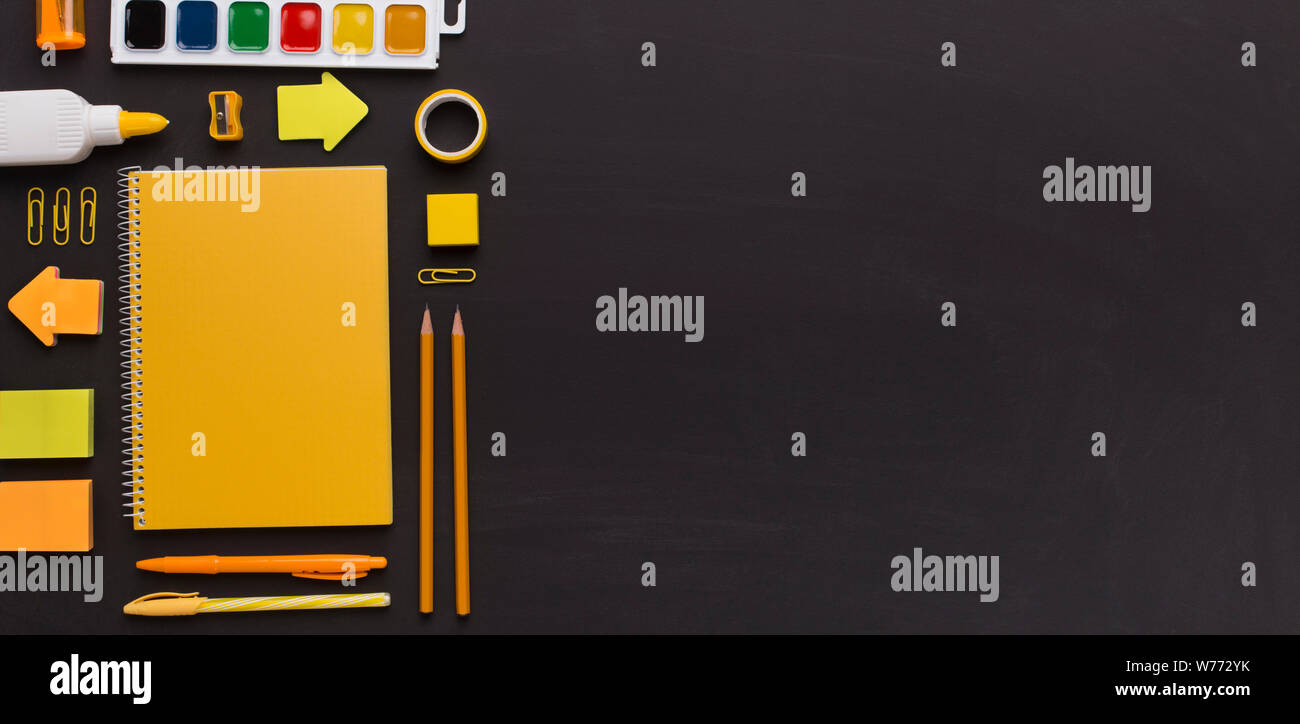 Yellow stylish Office stationery on chalk board background Stock Photo ...