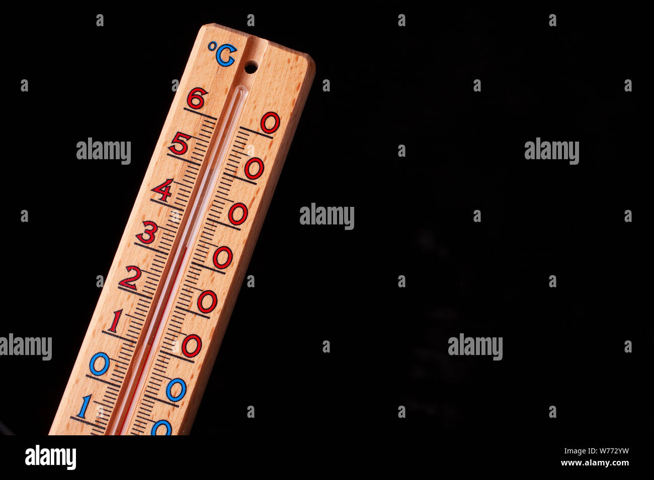 global warming - thermometer close up on black background Stock Photo ...
